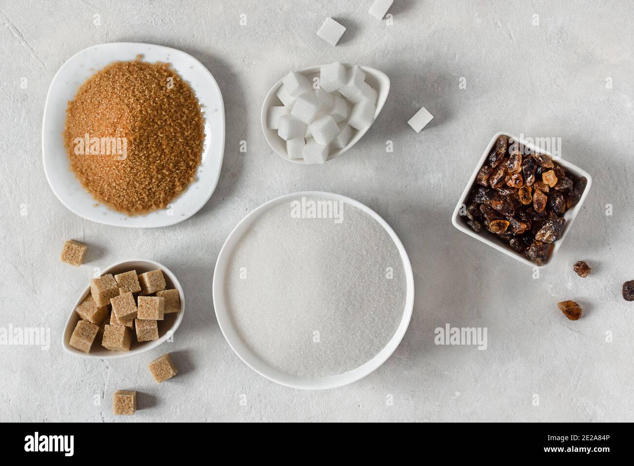 Various kinds of sugar. Different white and brown sugar in assortment ...