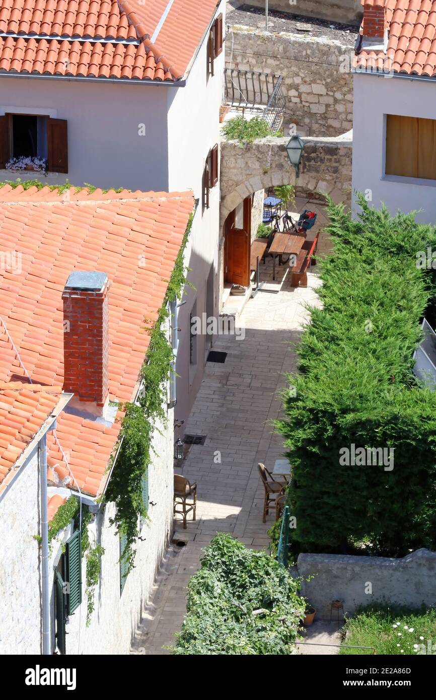 viewed from above a narrow street in the old town, Rab town , Rab ...