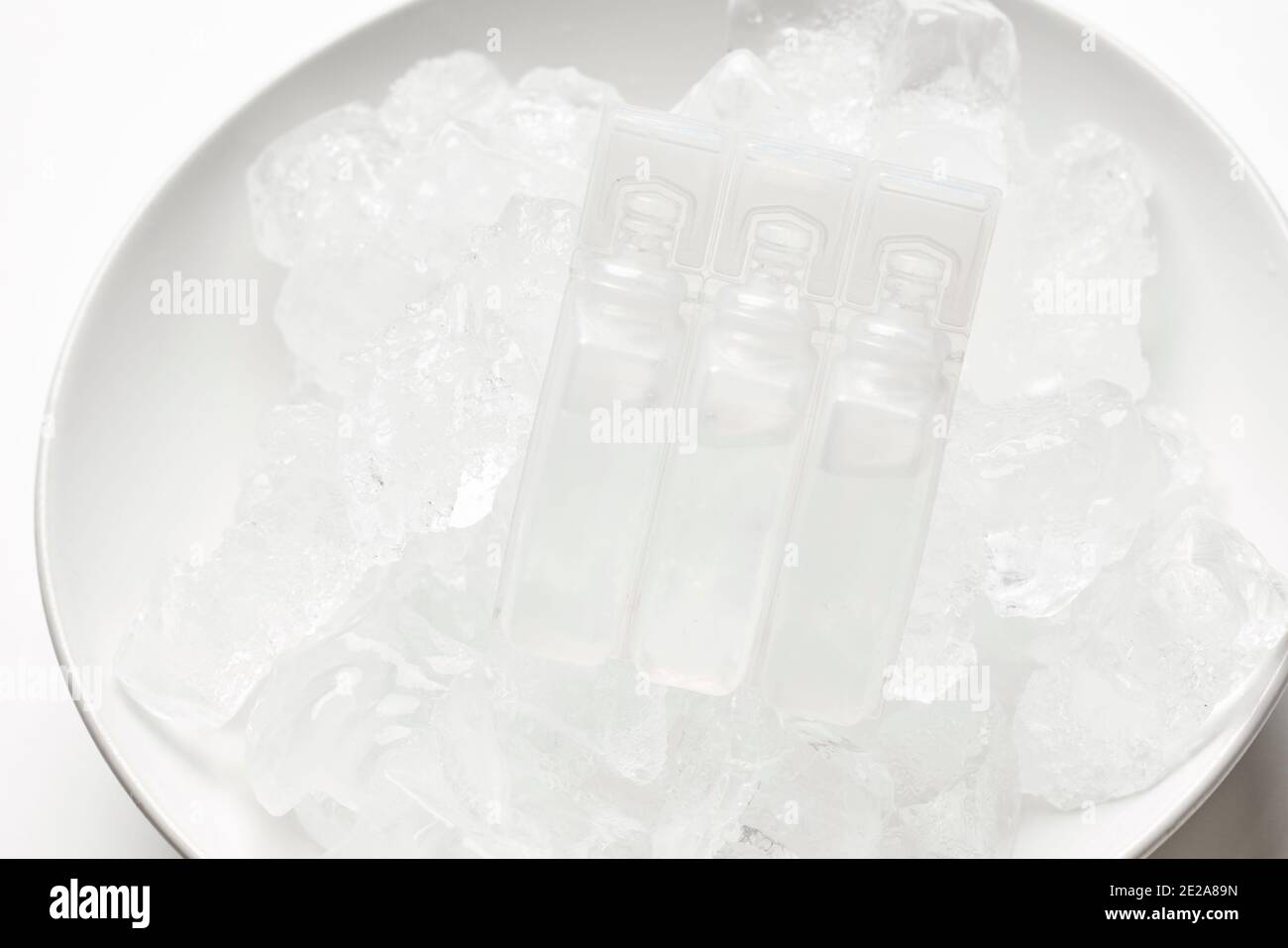 Vaccine storage fridge. Vials on the ice. Long-term storage of Covid-19 ...