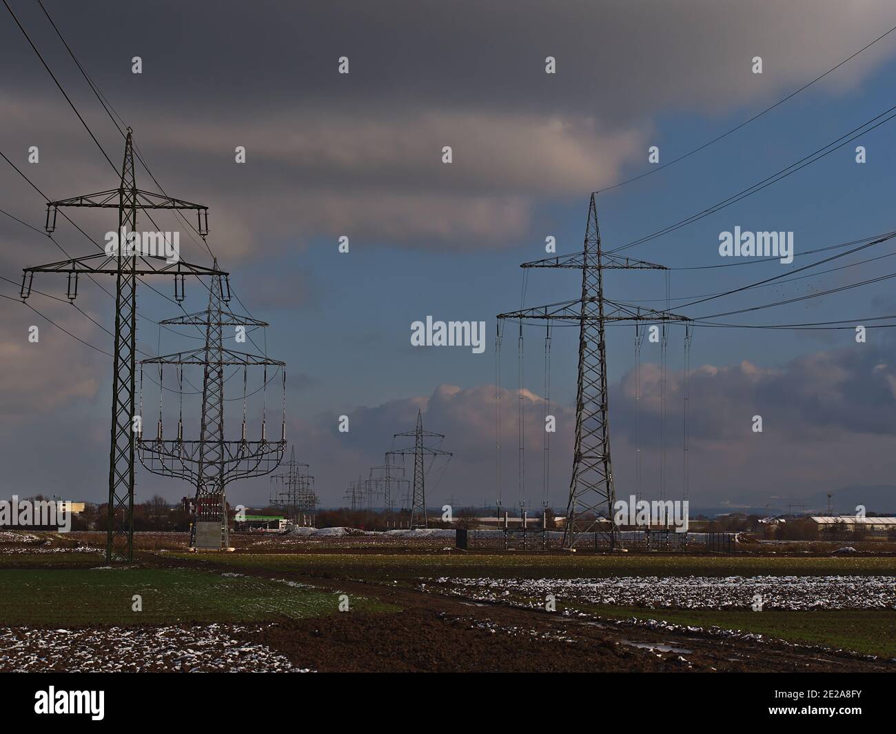 Electricity pylons covered in snow hi-res stock photography and images ...