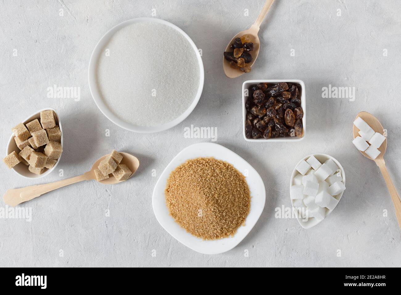 Various kinds of sugar. Different white and brown sugar in assortment ...