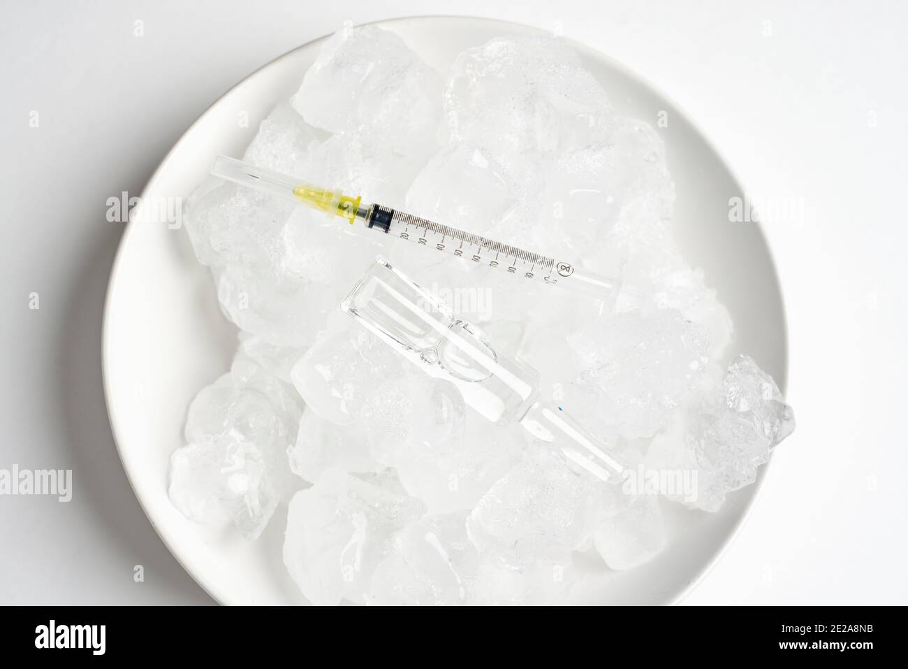 Vaccine storage fridge. Vials on the ice. Long-term storage of Covid-19 ...