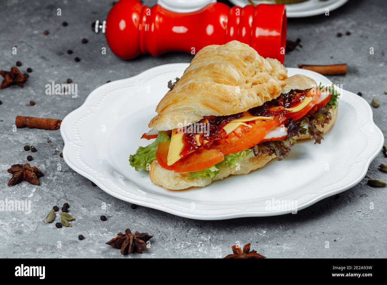 Delicious ham and cheddar cheese croissant with salad Stock Photo - Alamy