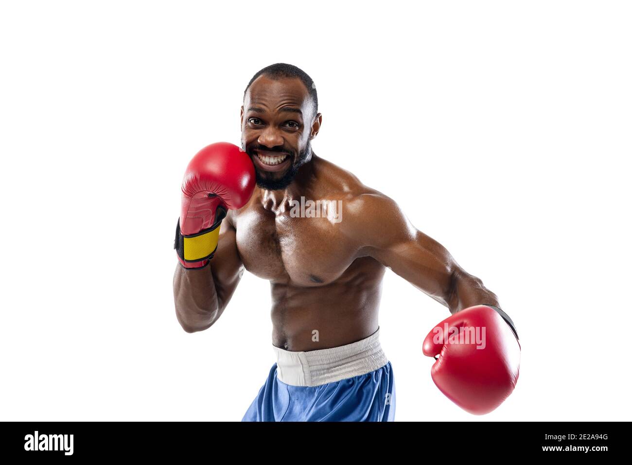 Happy. Funny, bright emotions of professional african-american boxer ...