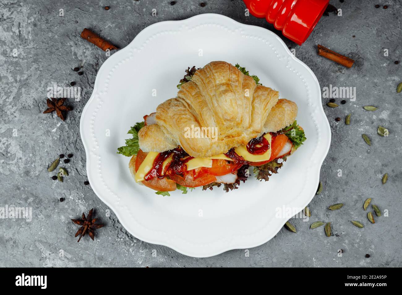 Delicious ham and cheddar cheese croissant with salad Stock Photo - Alamy