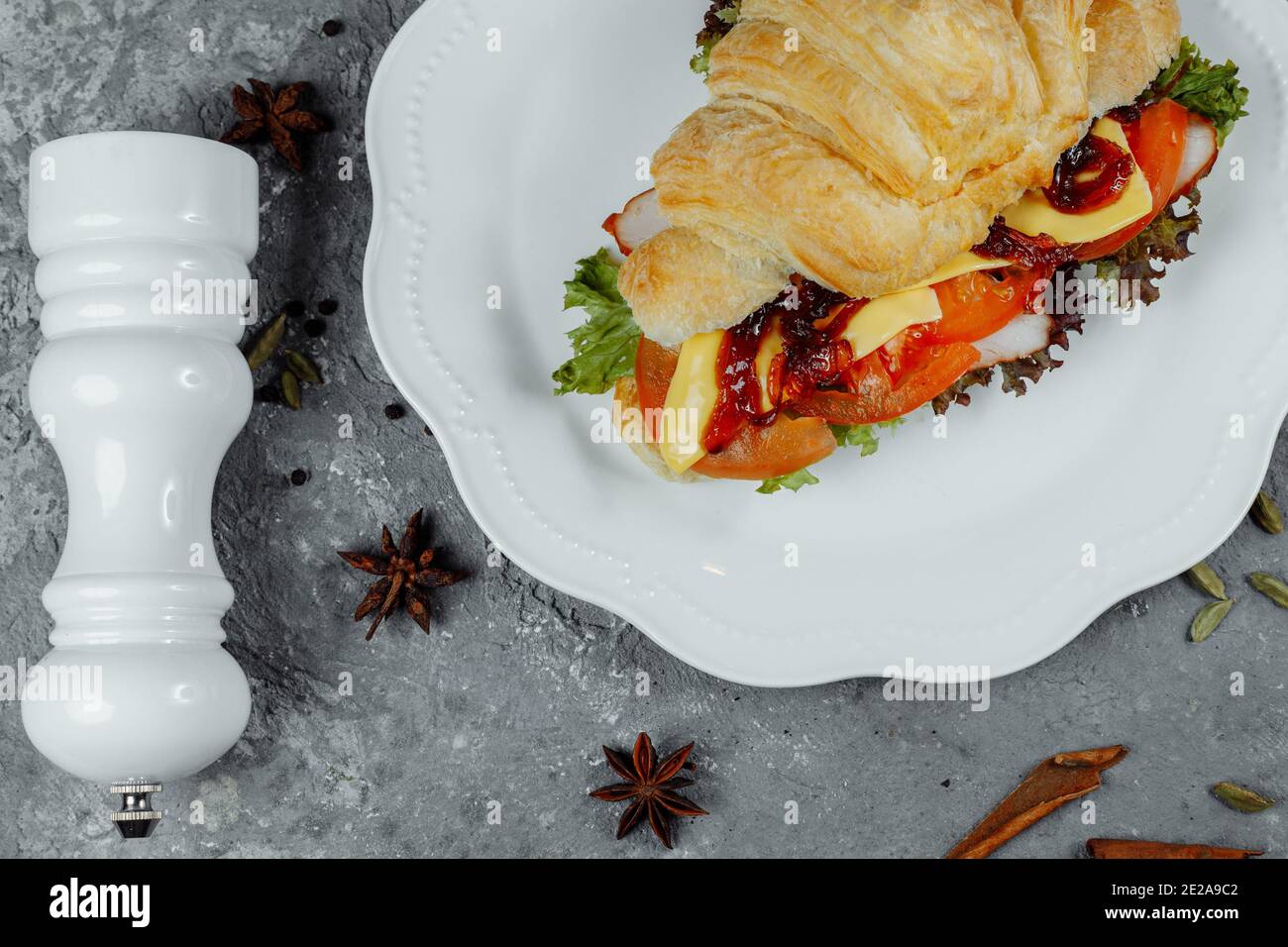 Delicious ham and cheddar cheese croissant with salad Stock Photo - Alamy