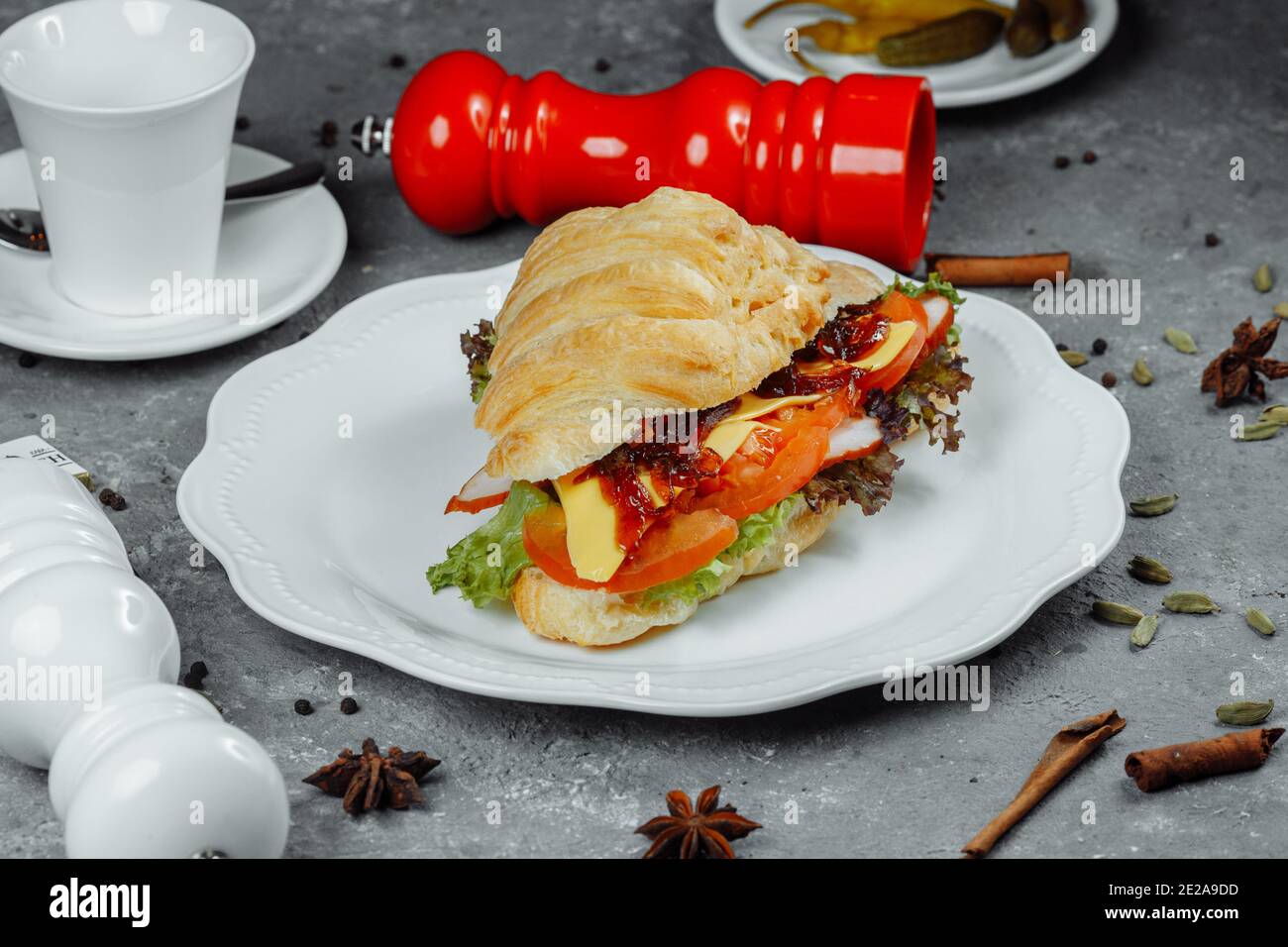 Delicious ham and cheddar cheese croissant with salad Stock Photo - Alamy