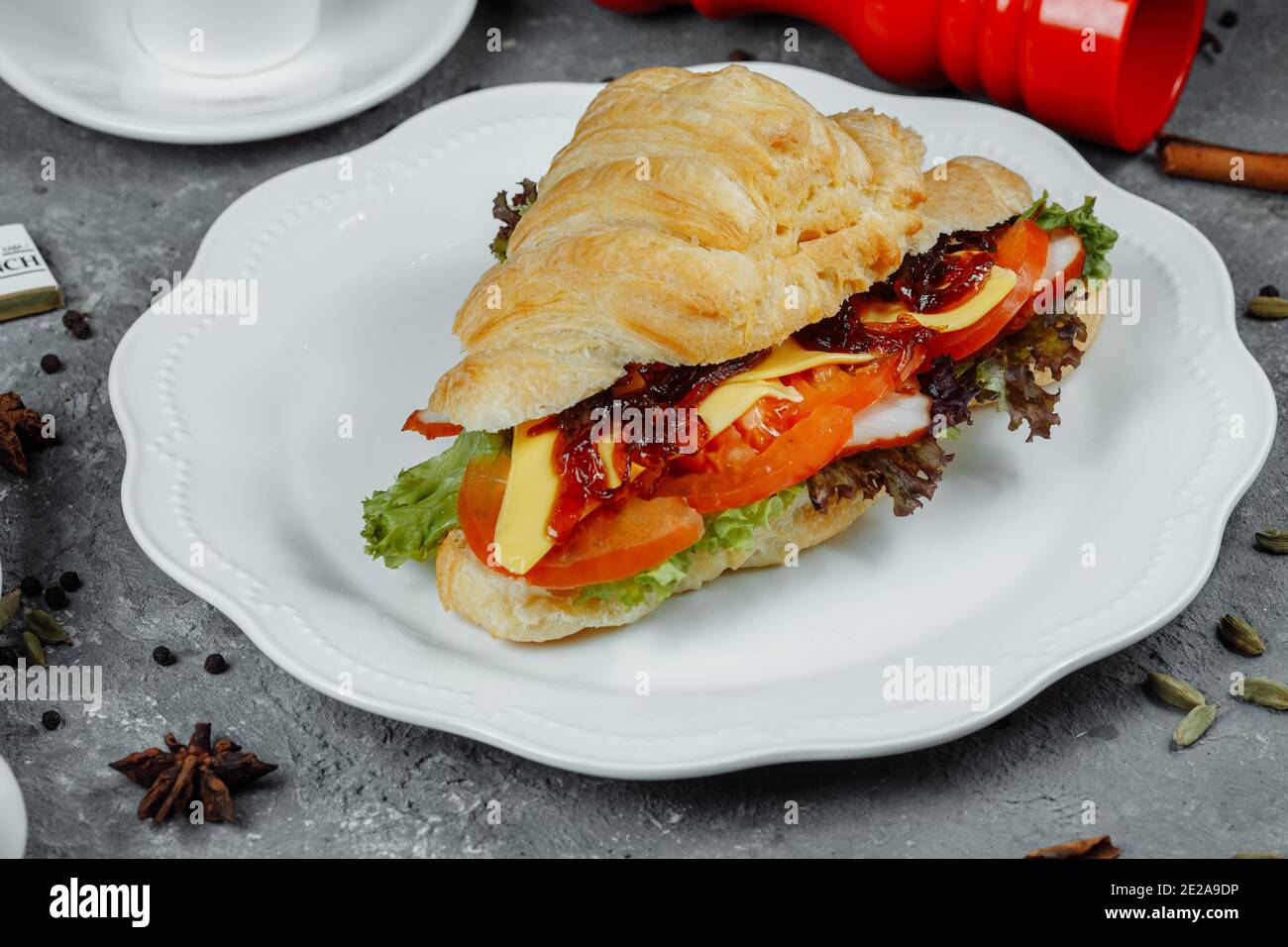 Delicious ham and cheddar cheese croissant with salad Stock Photo - Alamy