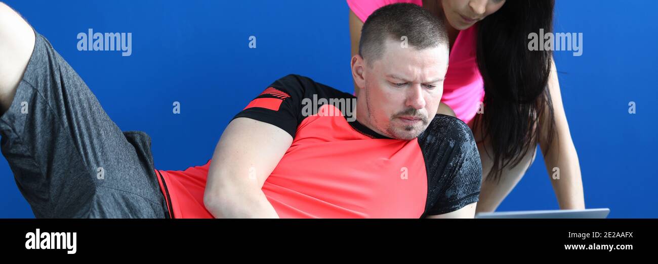 Serious female and strong man Stock Photo - Alamy