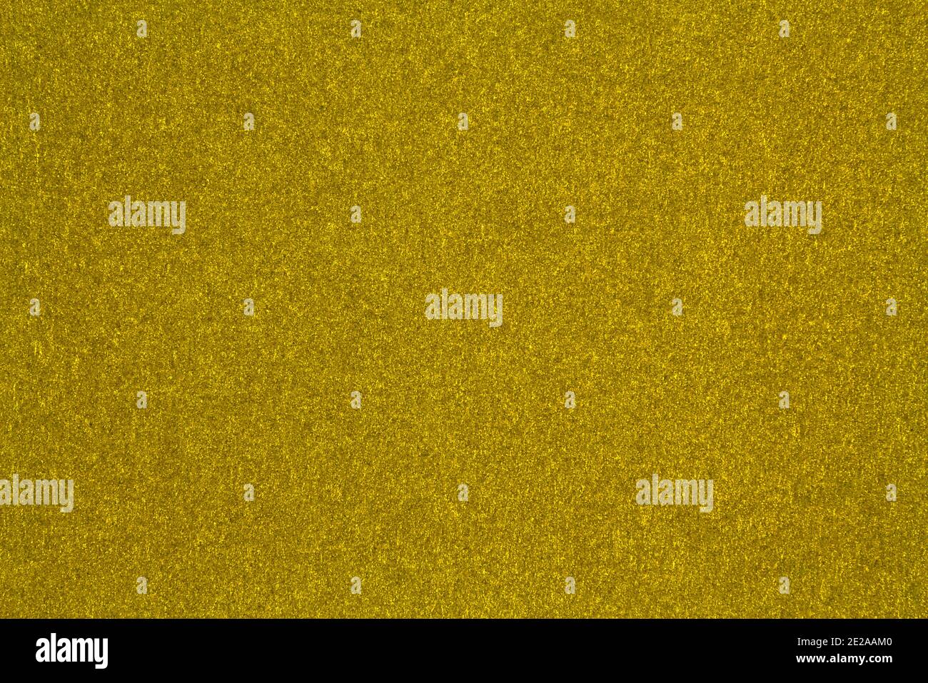 Gold colored sparkling texture background Stock Photo - Alamy