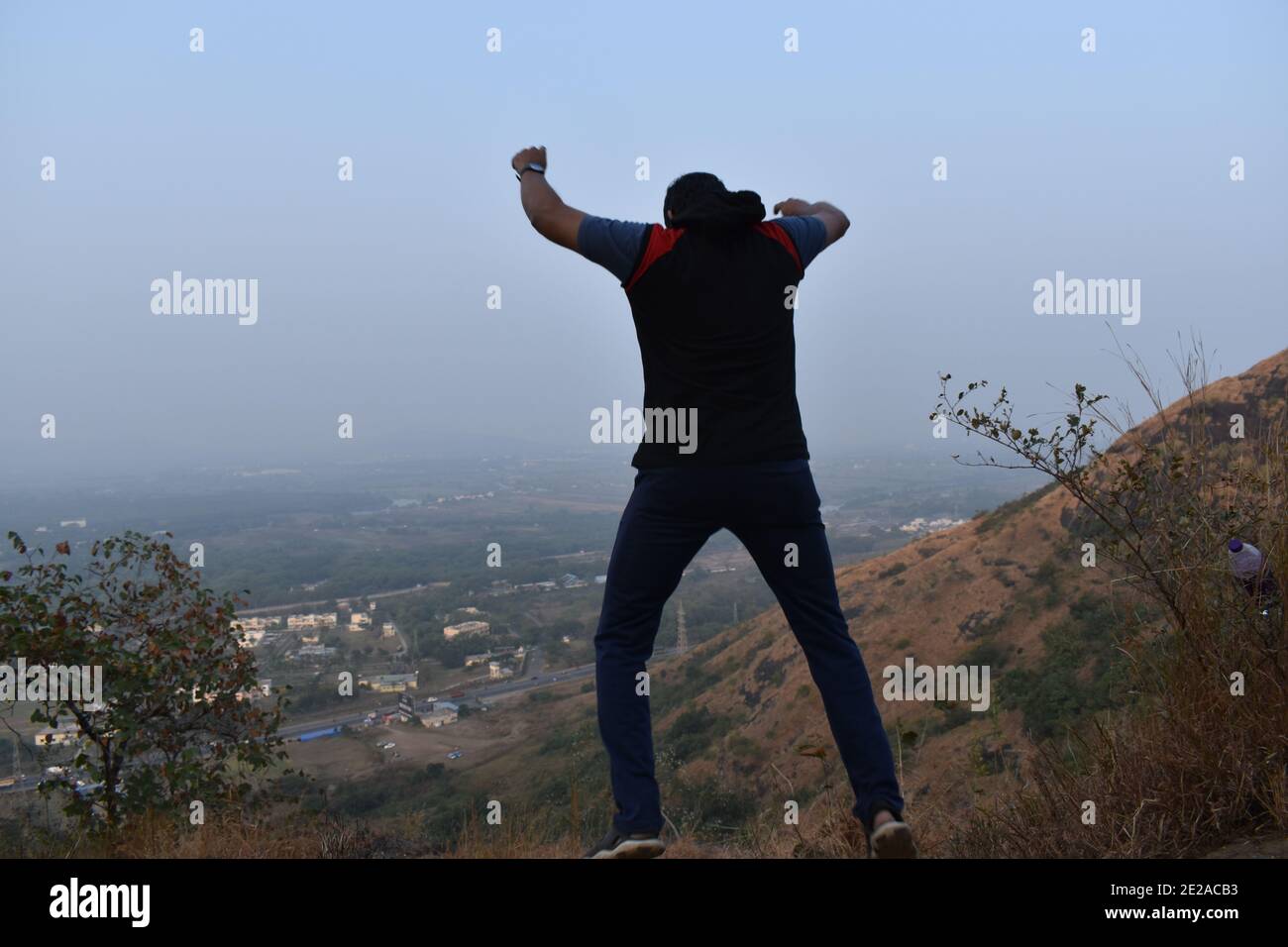 Back view of a tourist on the landscape Stock Photo - Alamy