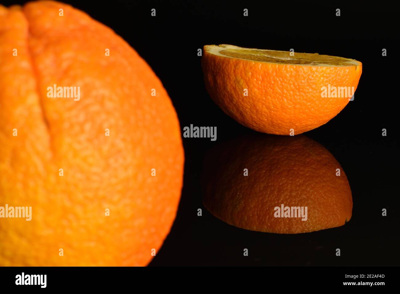 In the foreground, on the left side, is a portion of a whole sweet ...
