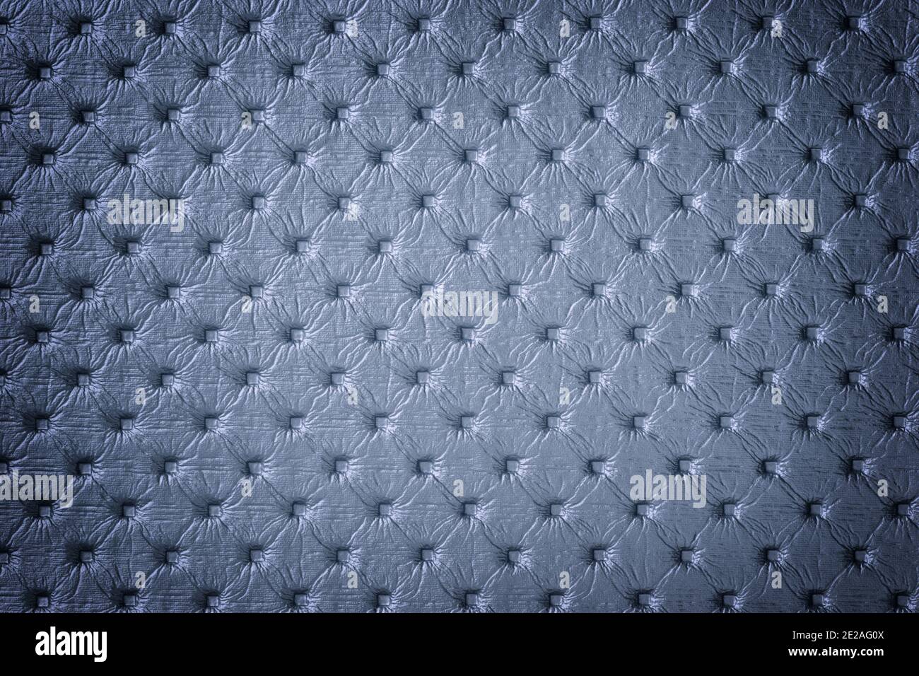 Texture of light blue leather background with capitone pattern, macro ...