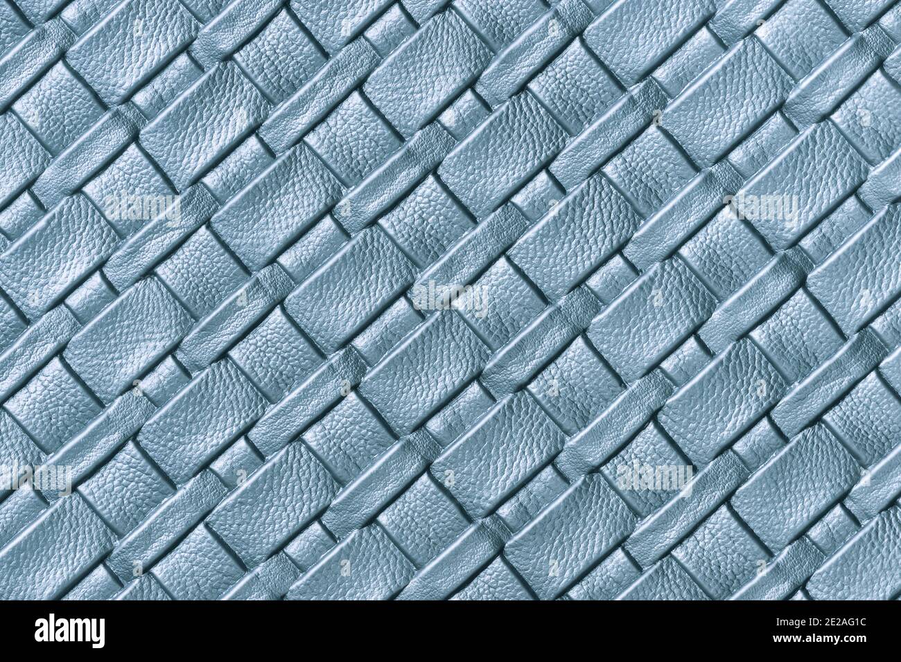 Texture of light blue leather background with wicker pattern, macro ...