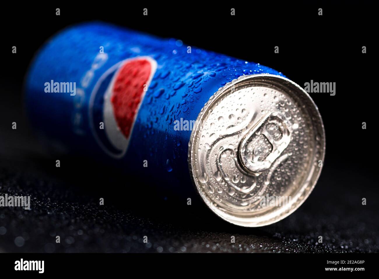 Editorial photo of Pepsi can with water droplets on black background ...
