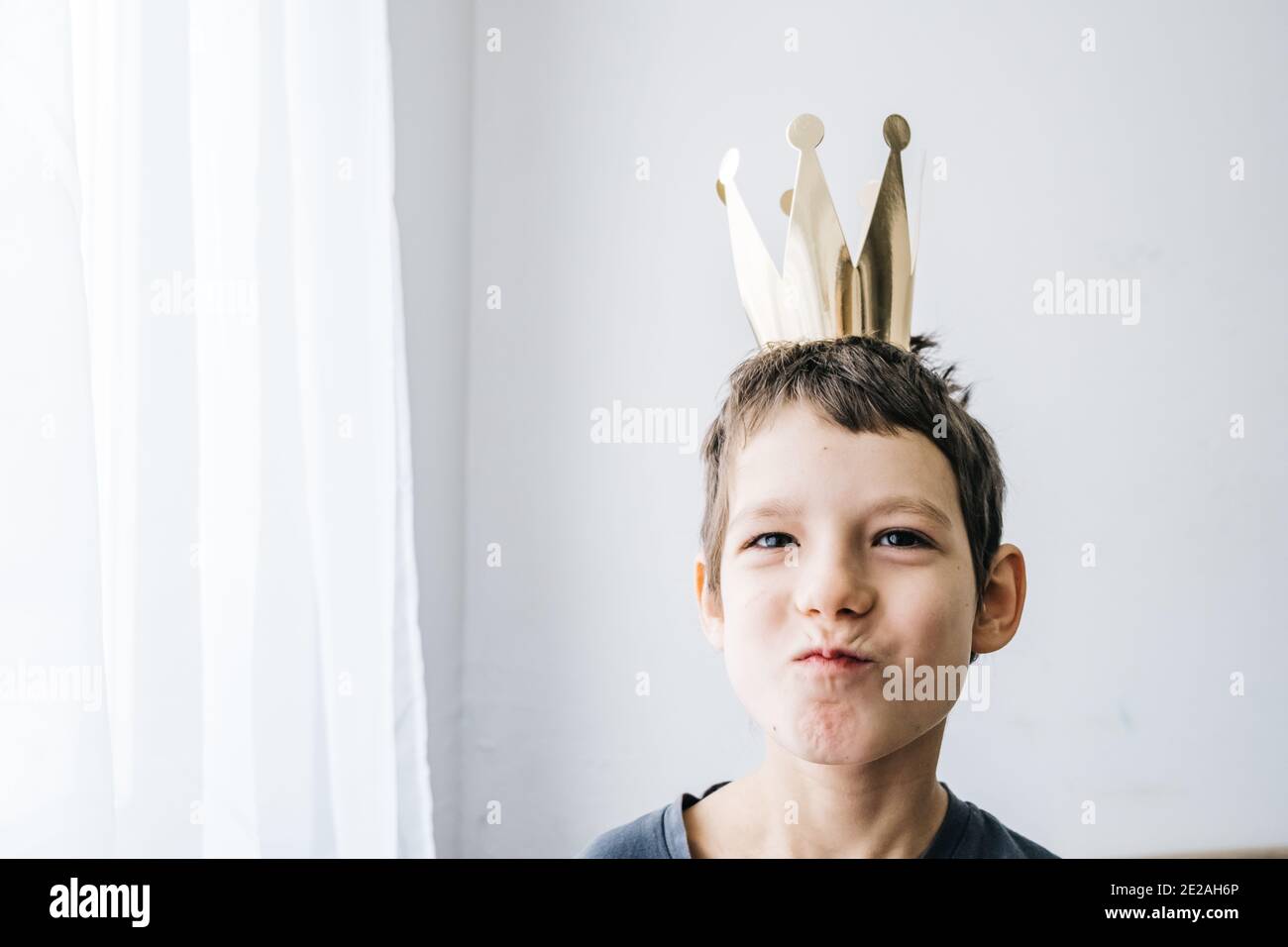 Happy inclusion and autism awareness concept. Autism schoolboy wearing ...