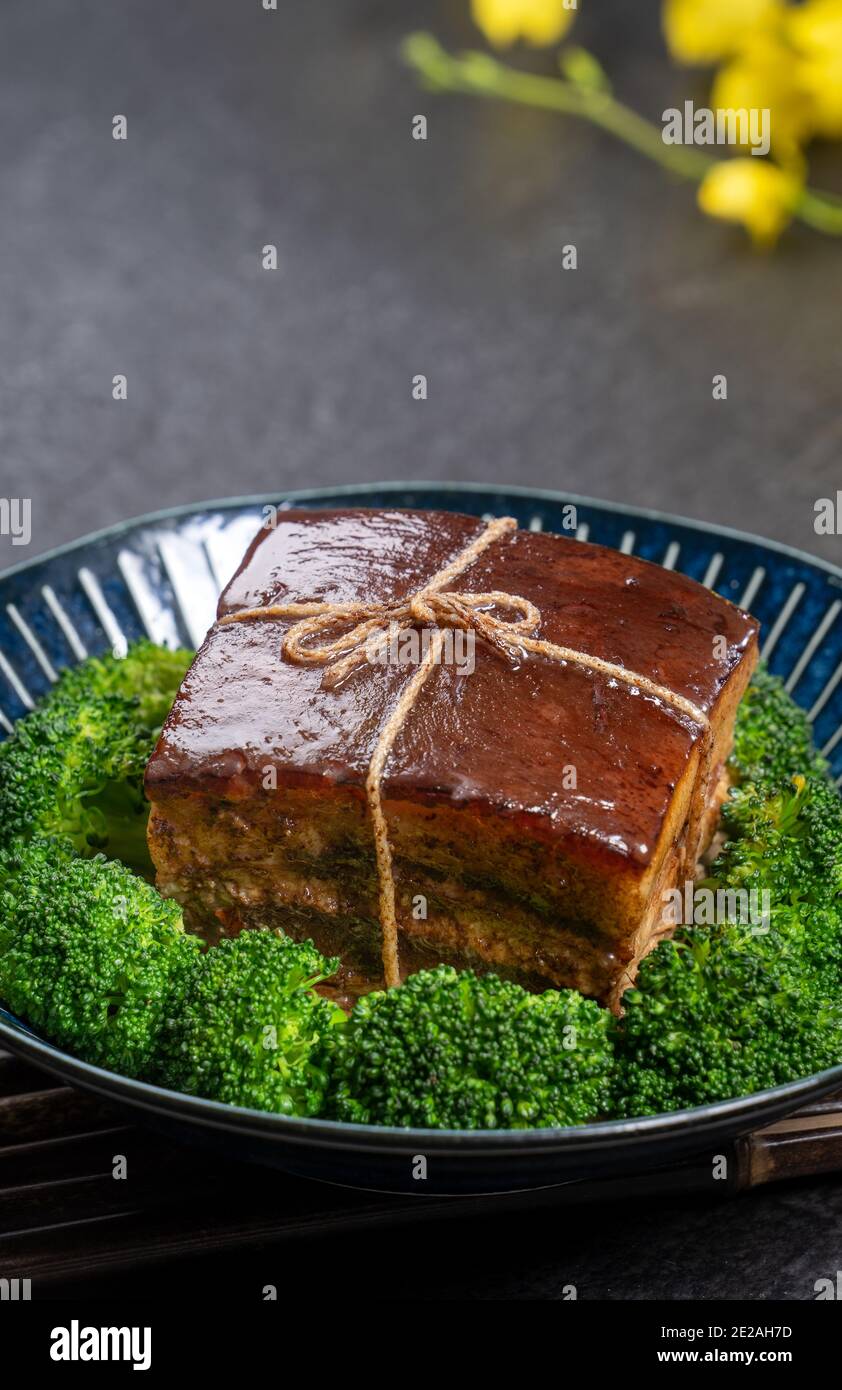 Dong Po Rou (Dongpo pork meat) in a beautiful blue plate with green ...