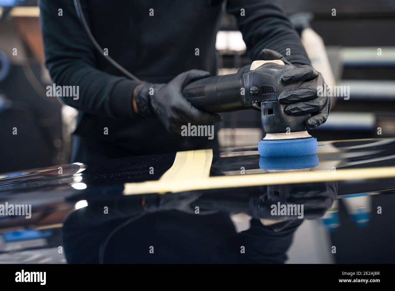 Professional car paint polishing process. Car detailing process Stock ...