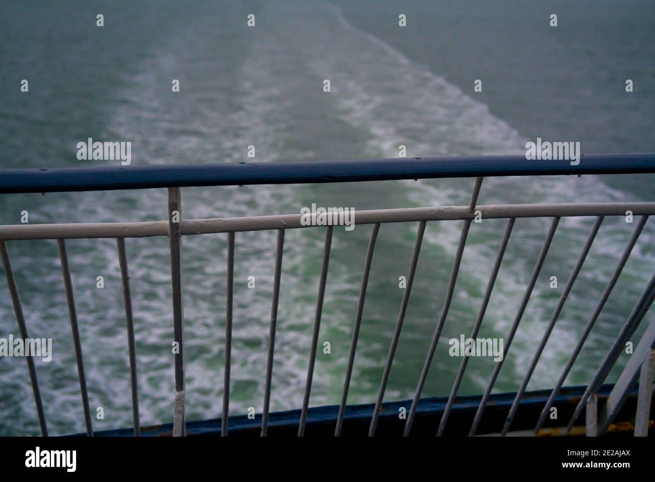 Hand rails and wake from a passenger ferry at sea Stock Photo - Alamy