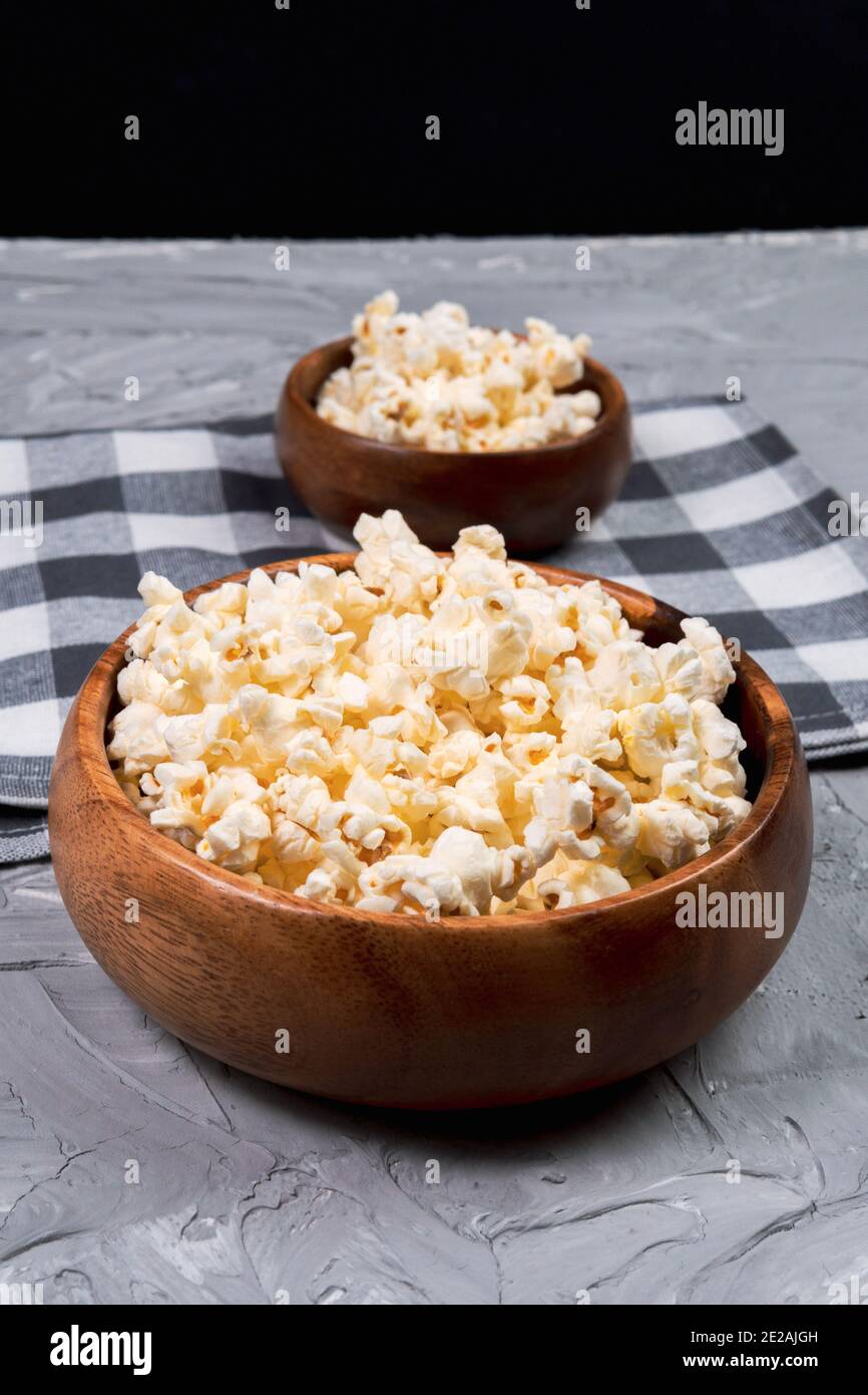 popcorn on the concrete gray background. fast food, corn, watching ...