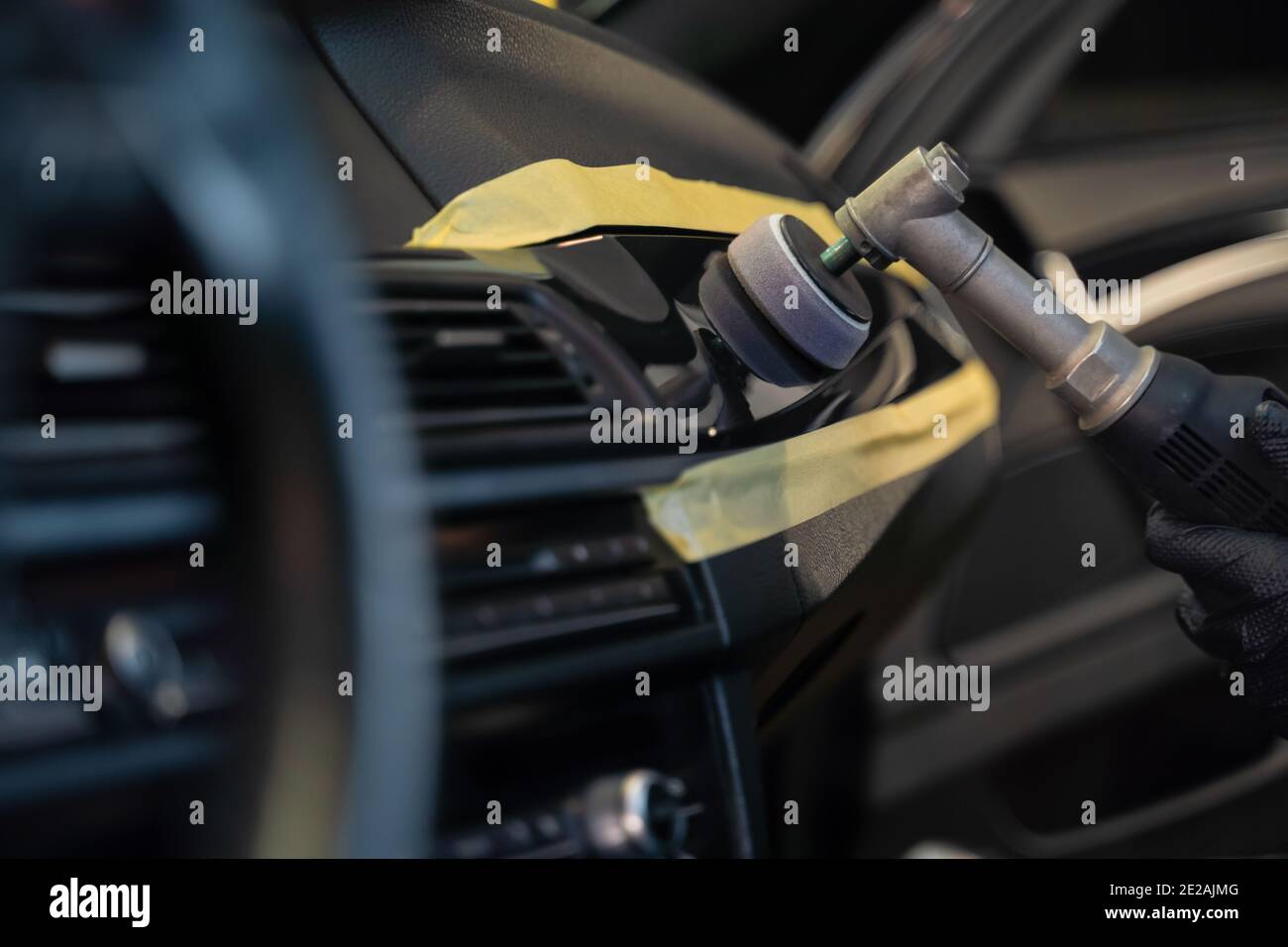Professional polishing car interior trim. Auto detailing concept Stock ...