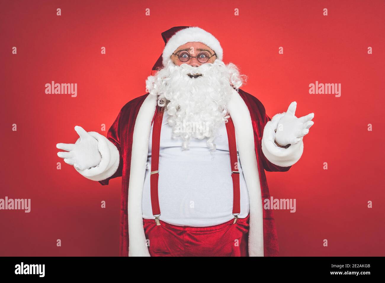 Funny crazy santa claus having fun on a red colored background Stock ...