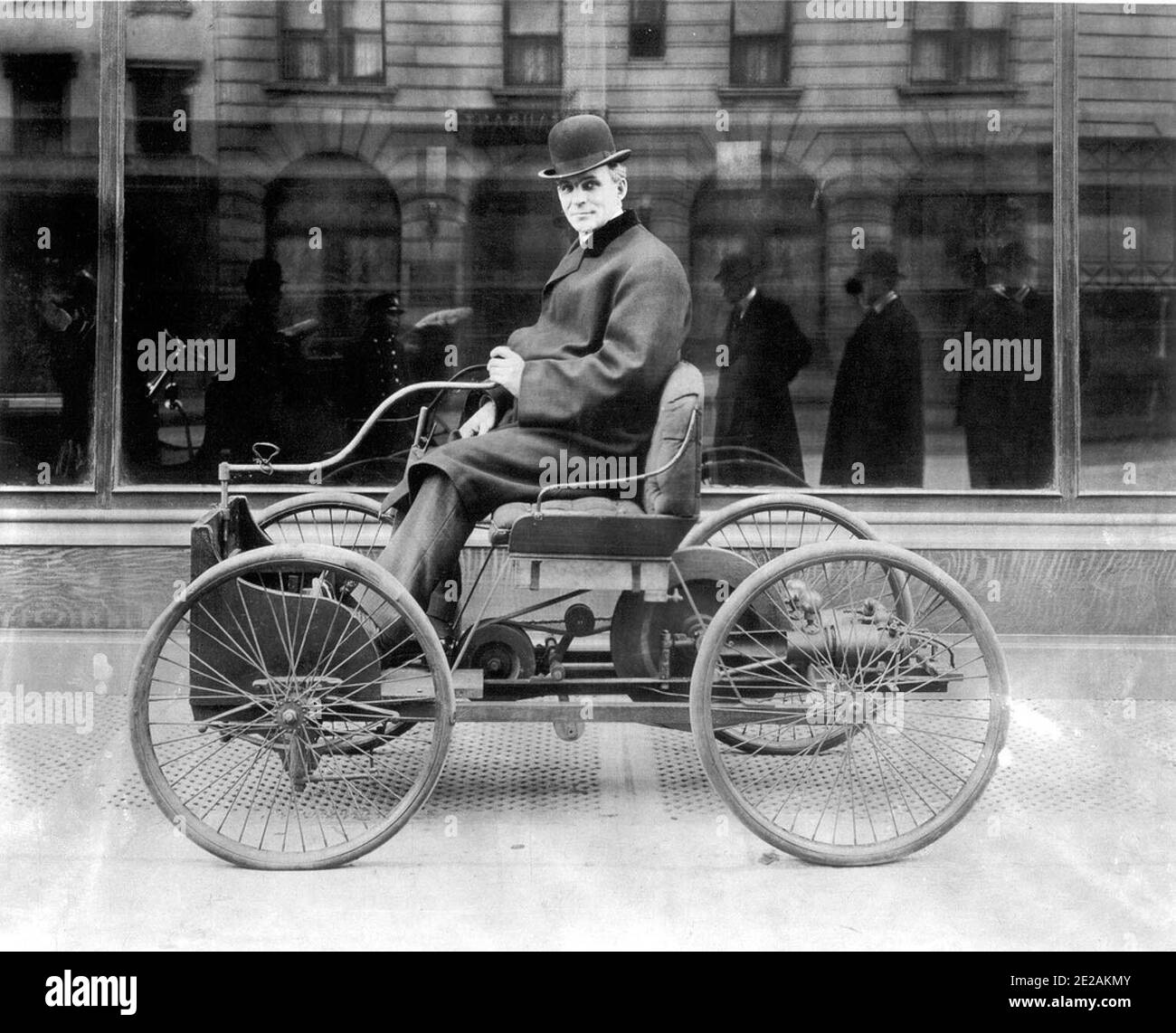 Henry Ford sits in his first automobile, the Ford Quadricycle, in 1896 ...