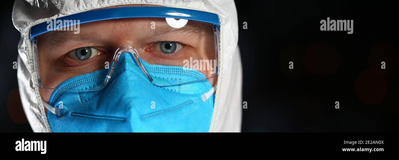 Man in PPE suit working during pandemic times Stock Photo - Alamy