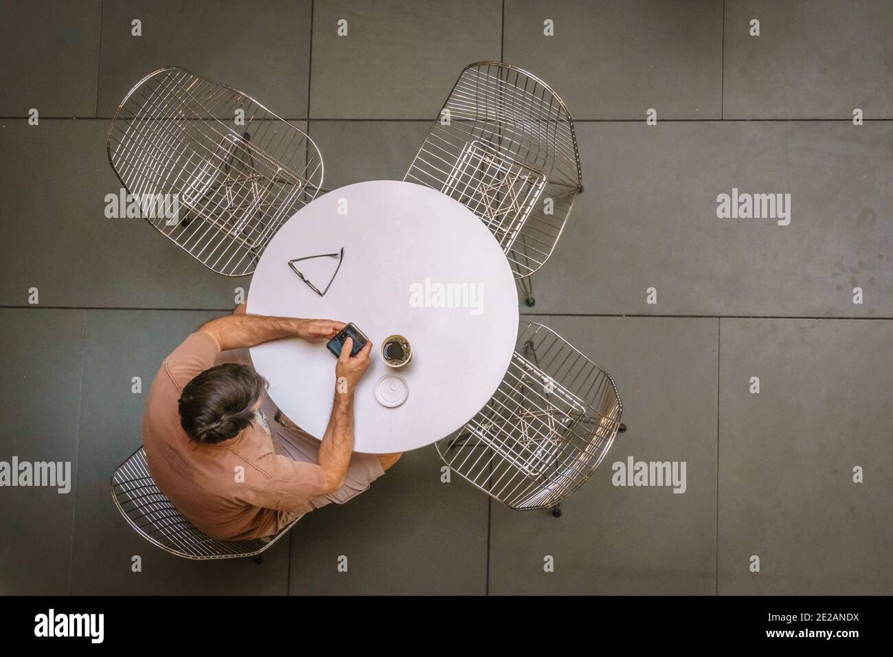 Man sitting from above hi-res stock photography and images - Alamy
