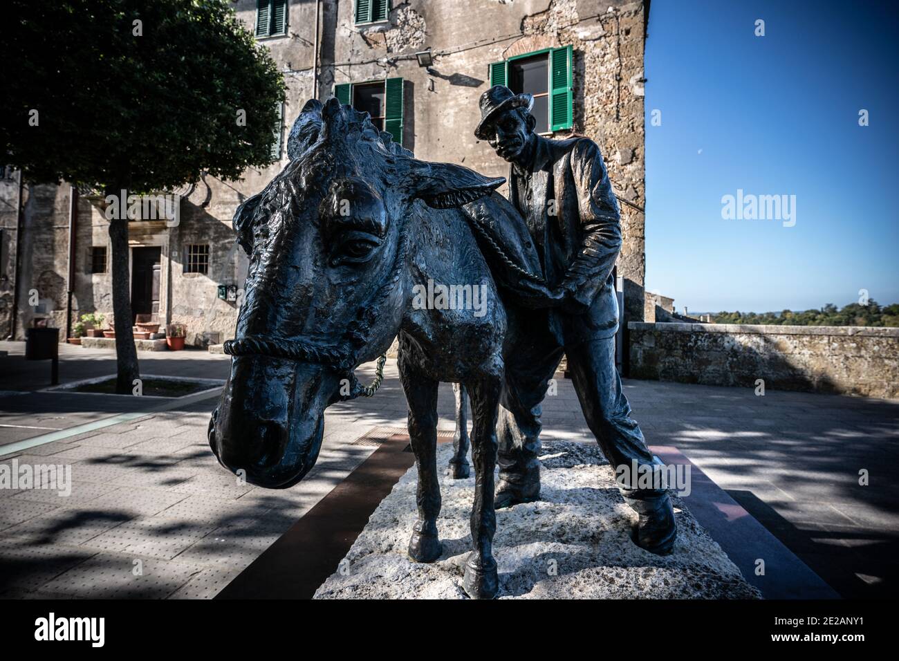 Il Villano statue in the old town of Pitigliano, Grosseto, Tuscany ...