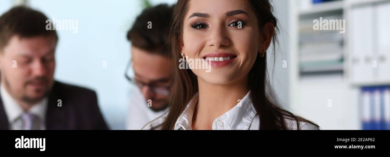 Happy clerk woman working with male colleagues Stock Photo - Alamy