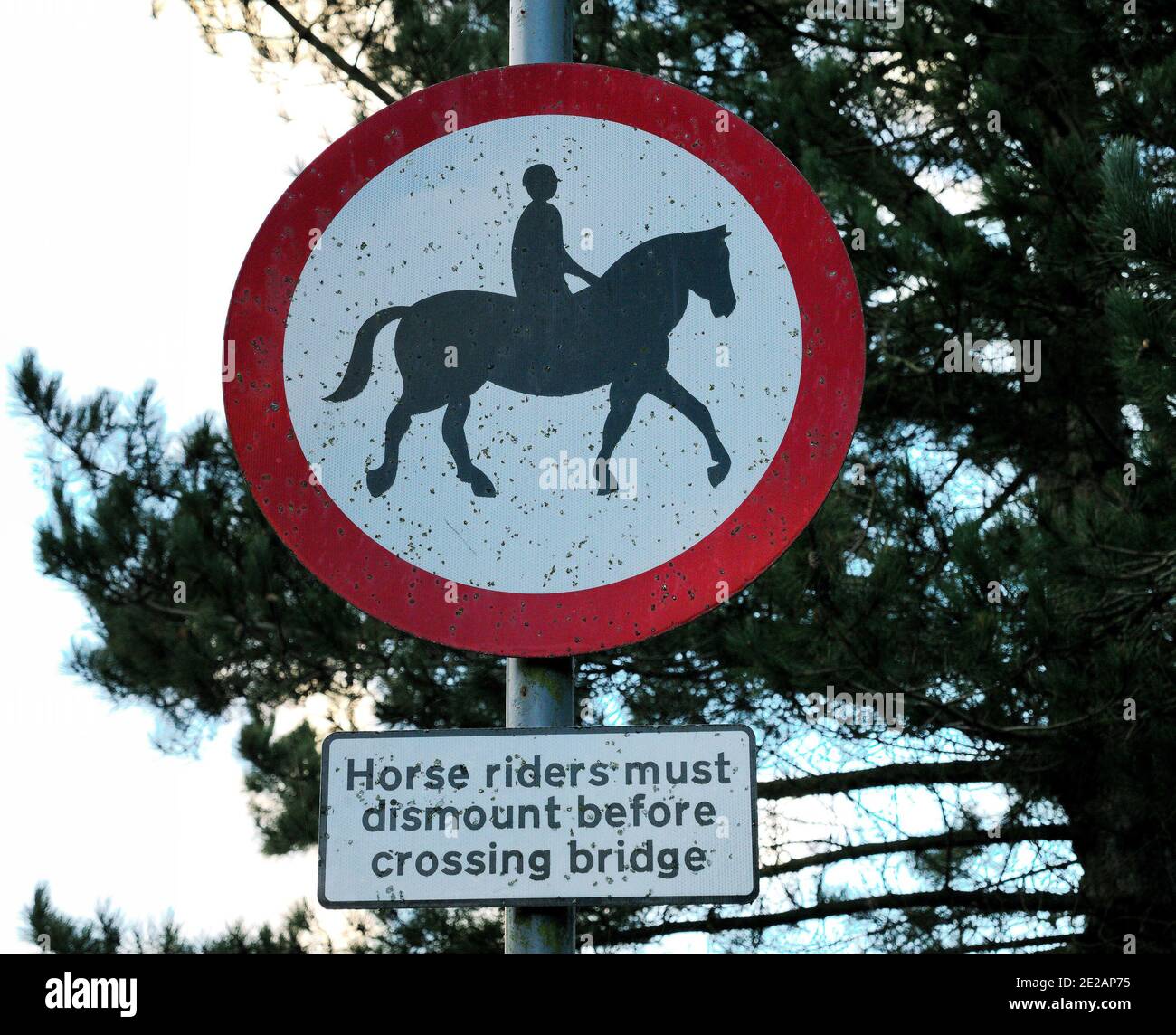 Road sign urging horse riders to dismount crossing a bridge Stock Photo ...