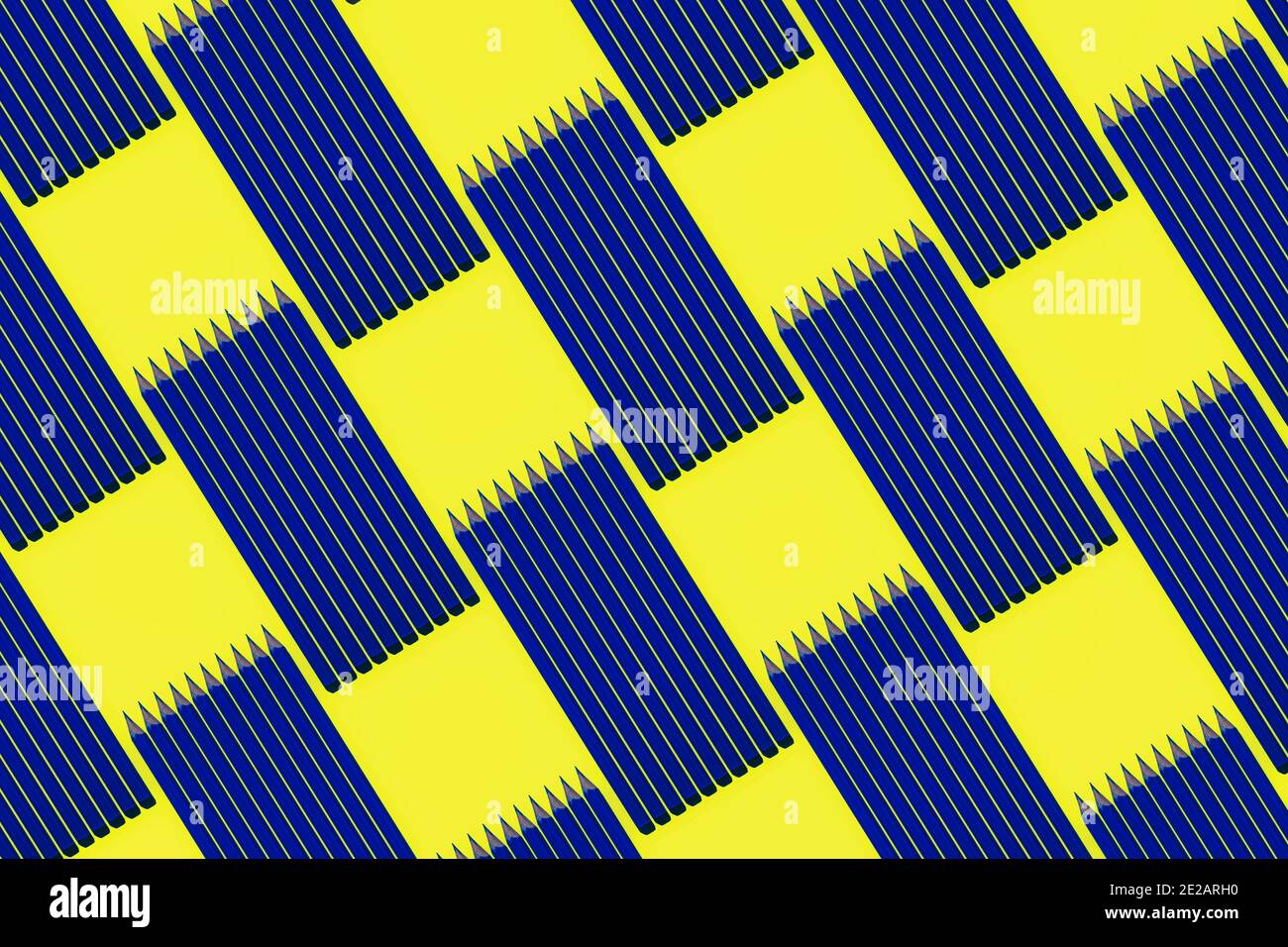 Pattern of blue pencils at yellow background Stock Photo - Alamy