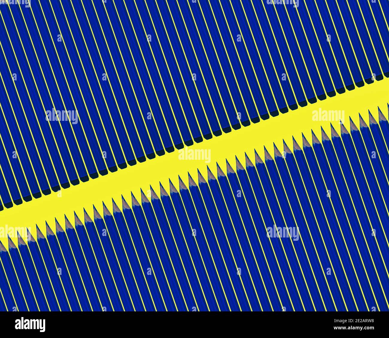 Pattern of blue pencils at yellow background Stock Photo - Alamy