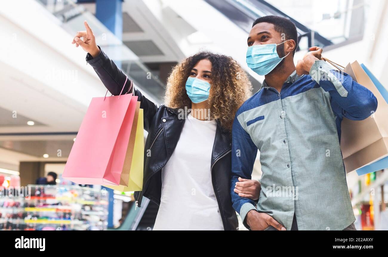 Young couple protective face masks hi-res stock photography and images ...