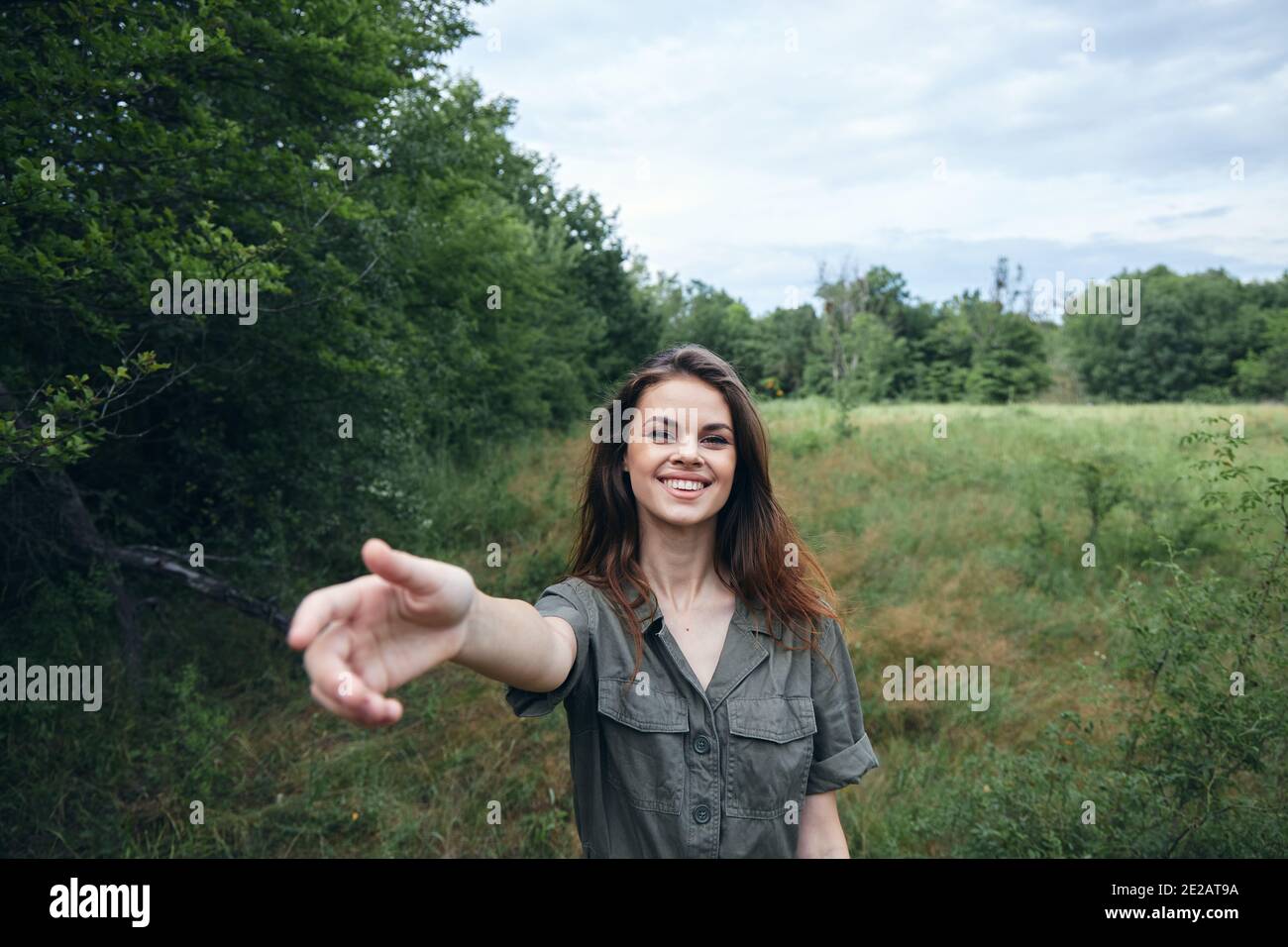 Happy female walk hands outstretched hi-res stock photography and ...