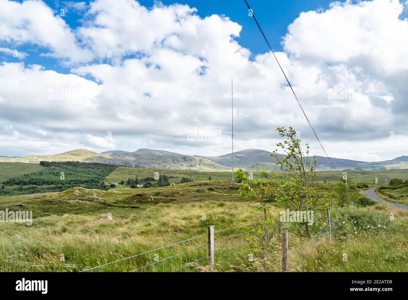 Street view of transmitter tower on an agricultural field in the irish ...