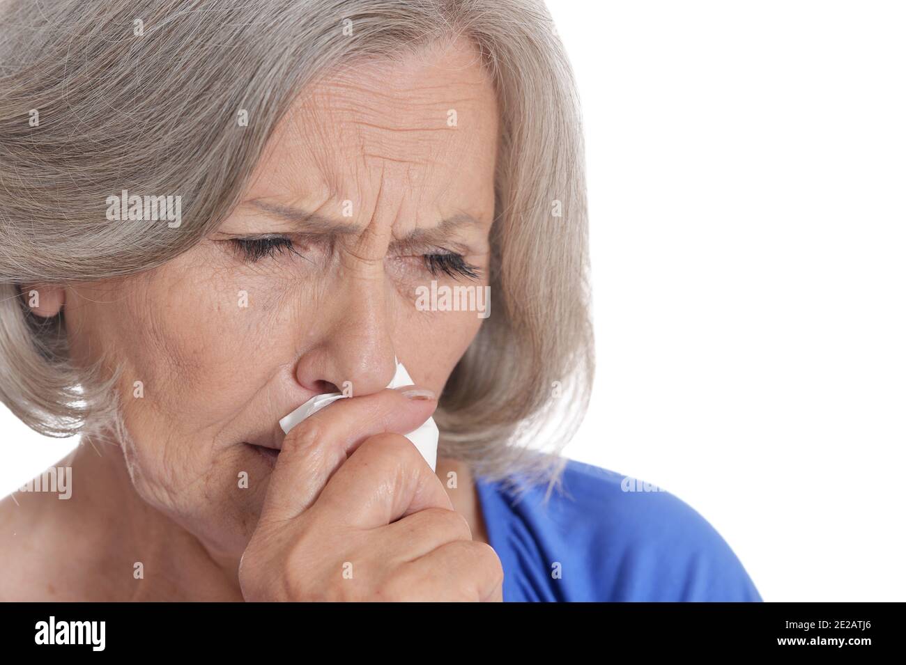 Crying senior woman isolated on white background Stock Photo - Alamy