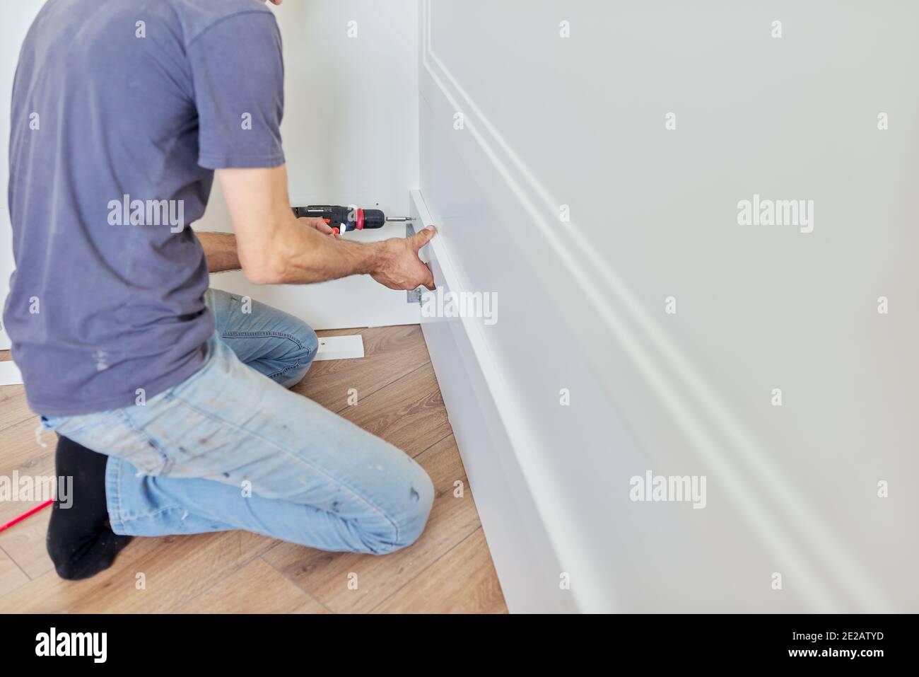 Close up detail of furniture and hands of carpenter worker with ...