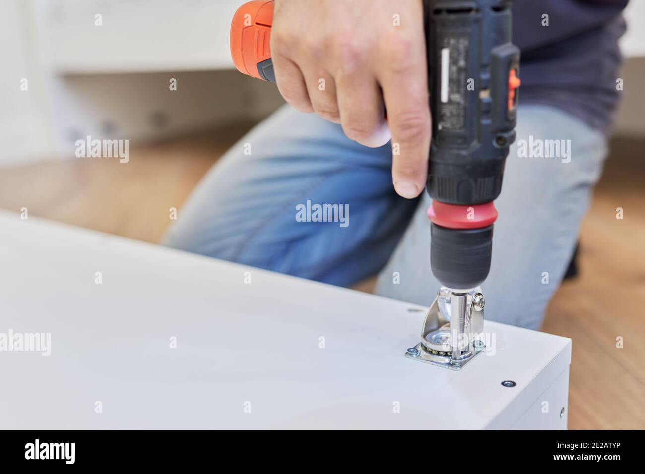 Close up detail of furniture and hands of carpenter worker with ...