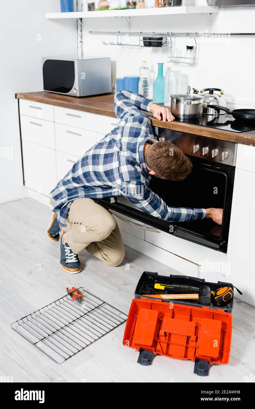 Microwave oven man hi-res stock photography and images - Alamy