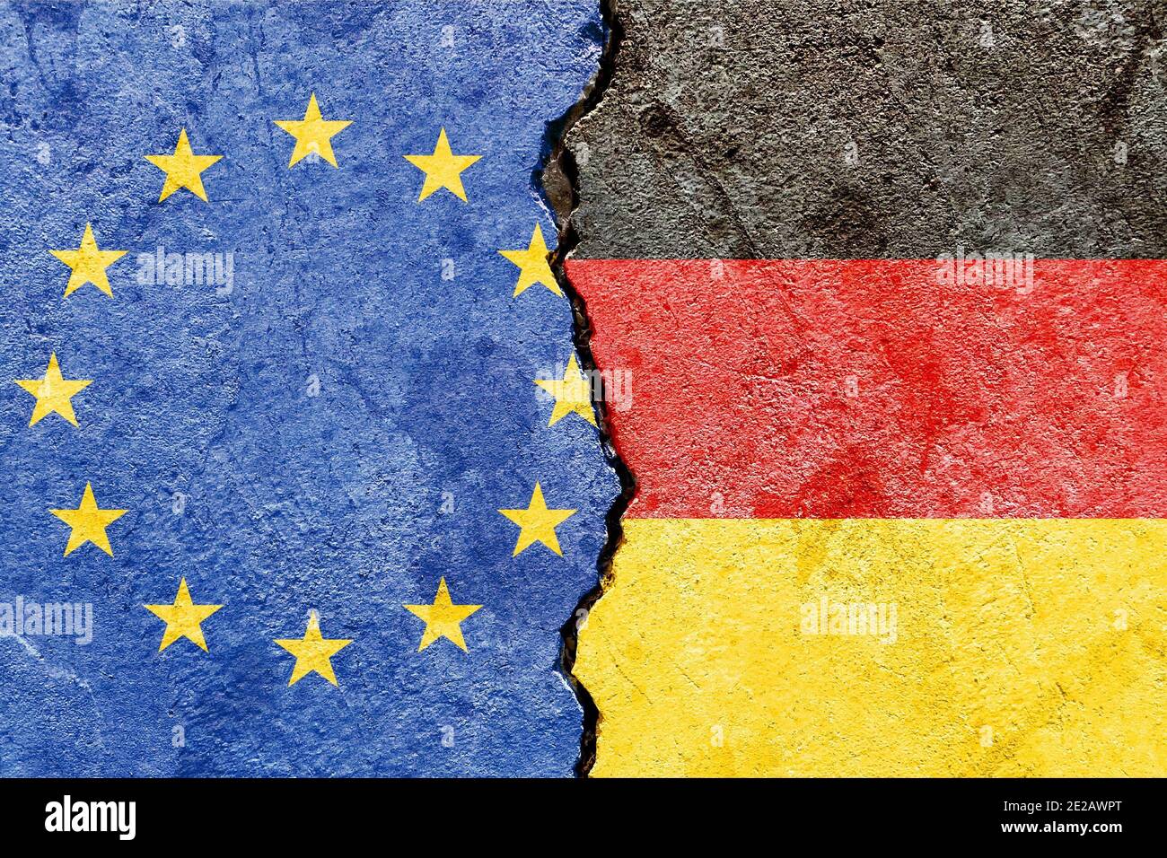 View of EU VS Germany national flags isolated on broken cracked ...