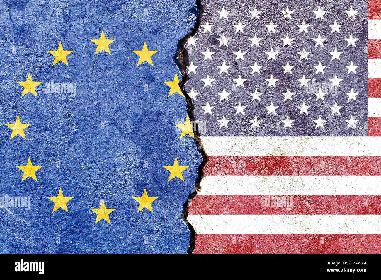 View of EU VS USA national flags isolated on broken cracked concrete ...