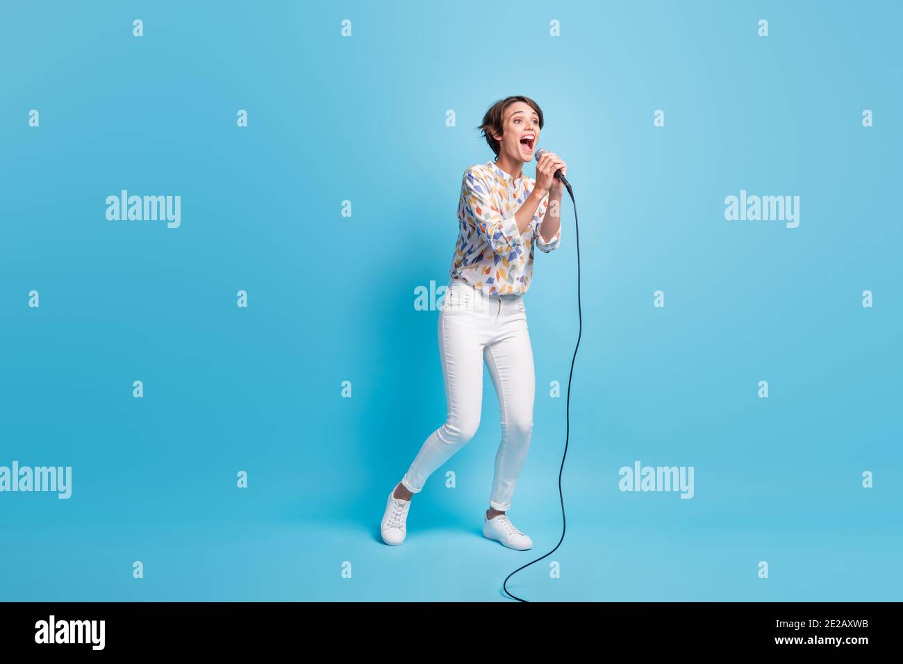 Full body photo of young excited girl have fun enjoy sing microphone ...
