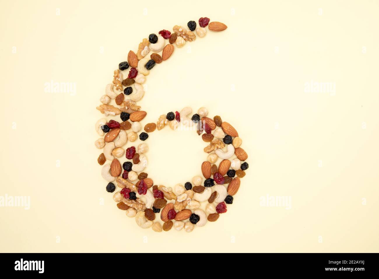 High angle shot of nuts and seeds shaped like the number 6 Stock Photo ...