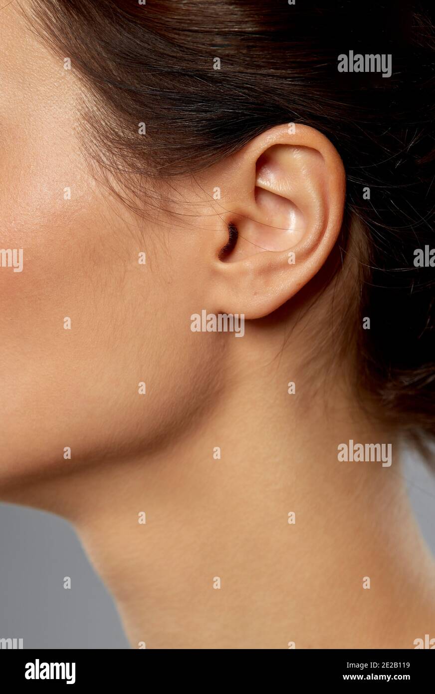 Ear piercing woman close up hi-res stock photography and images - Alamy