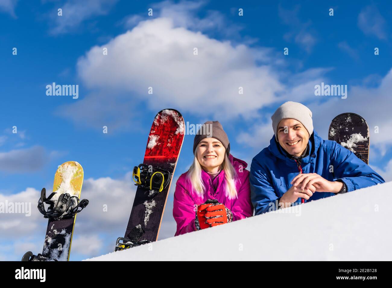 Family winter vacation in ski resort Stock Photo - Alamy