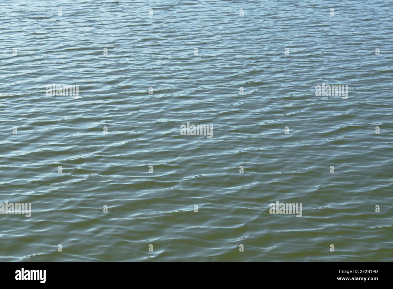 water rippled and flowing on river Stock Photo - Alamy