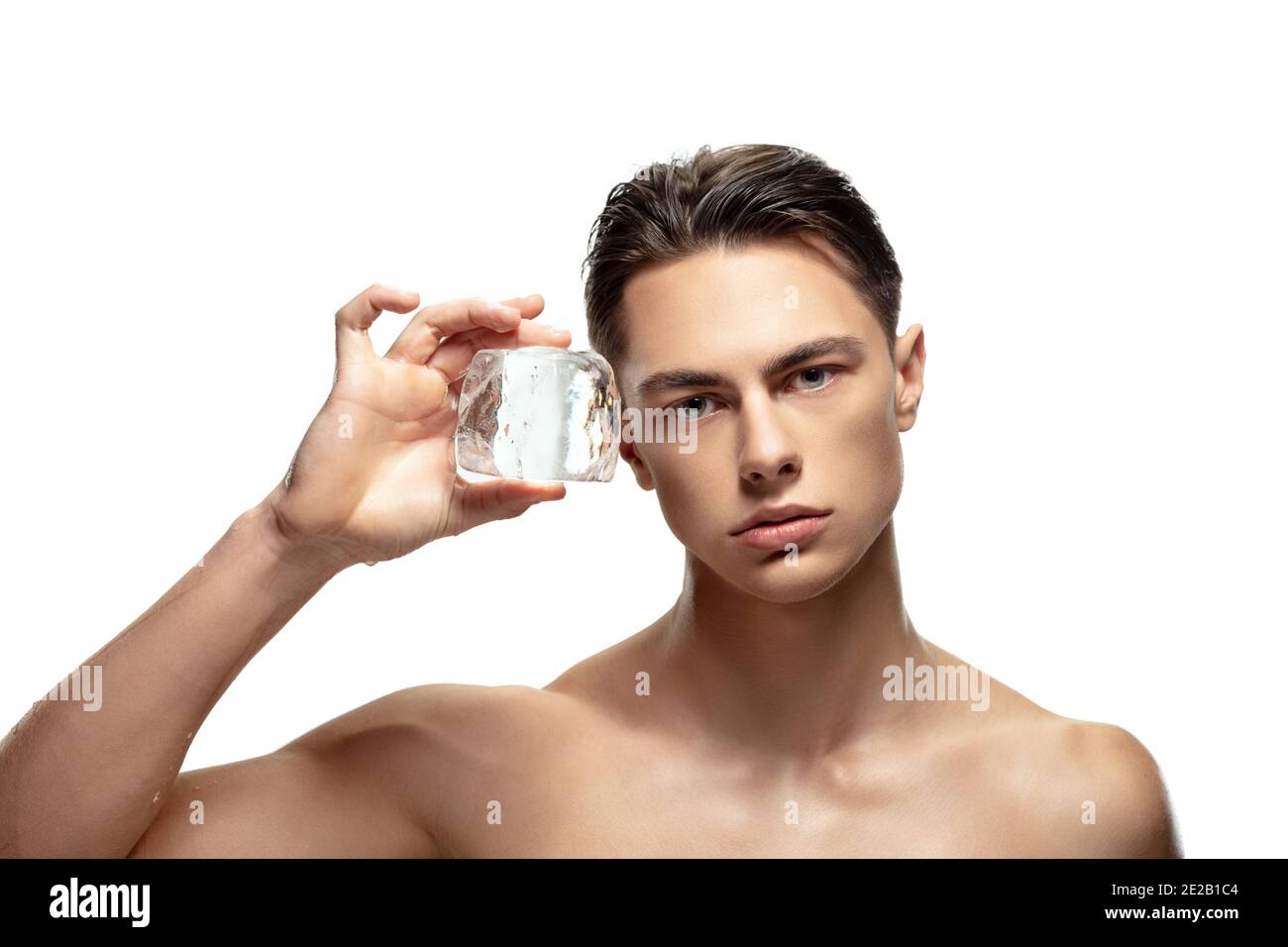 Freshness. Portrait of young man isolated on white studio background ...