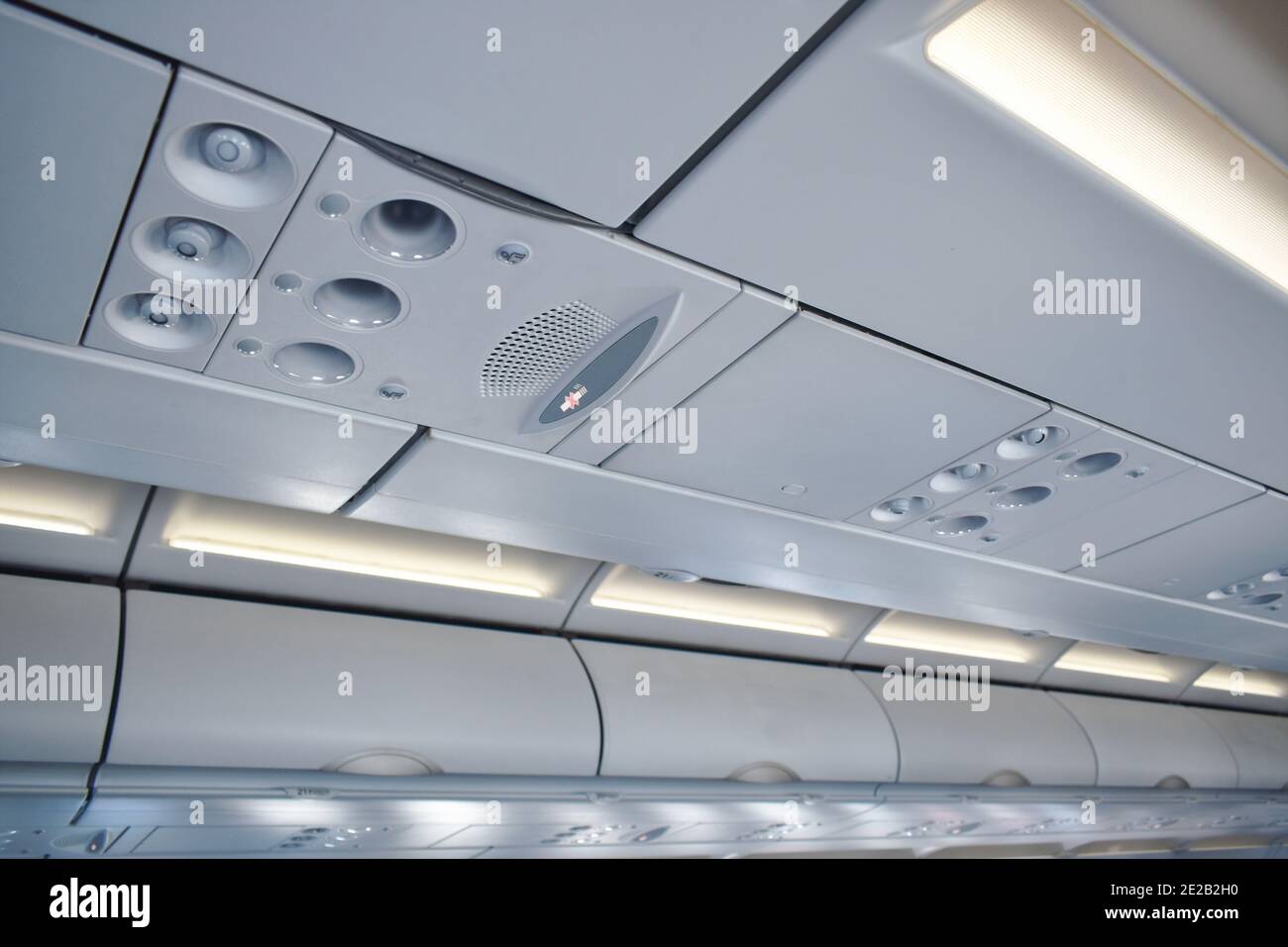 Inside airplane cabinet hi-res stock photography and images - Alamy